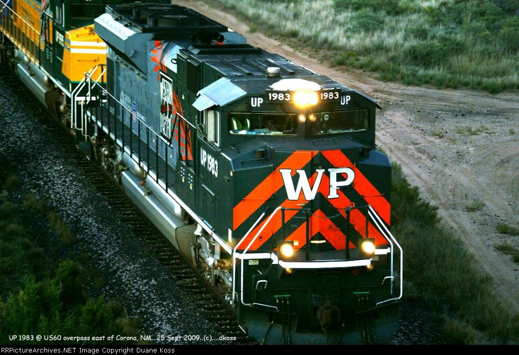 UP 1983 coming out of S curve east of town